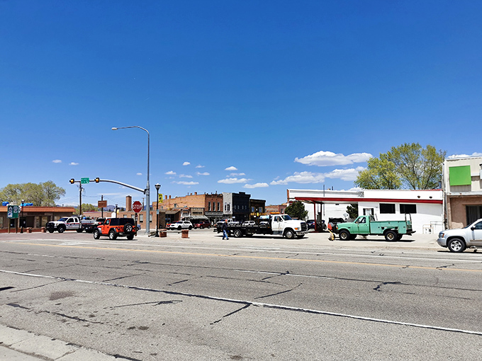 Downtown Panguitch under that impossibly blue Utah sky—where traffic jams involve three cars and everyone waves at each other.