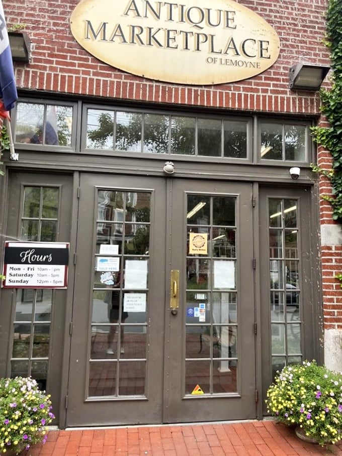 Those wooden doors might as well be a time portal. The vintage sign promises adventures while the hours posted suggest: clear your schedule, you'll need it.