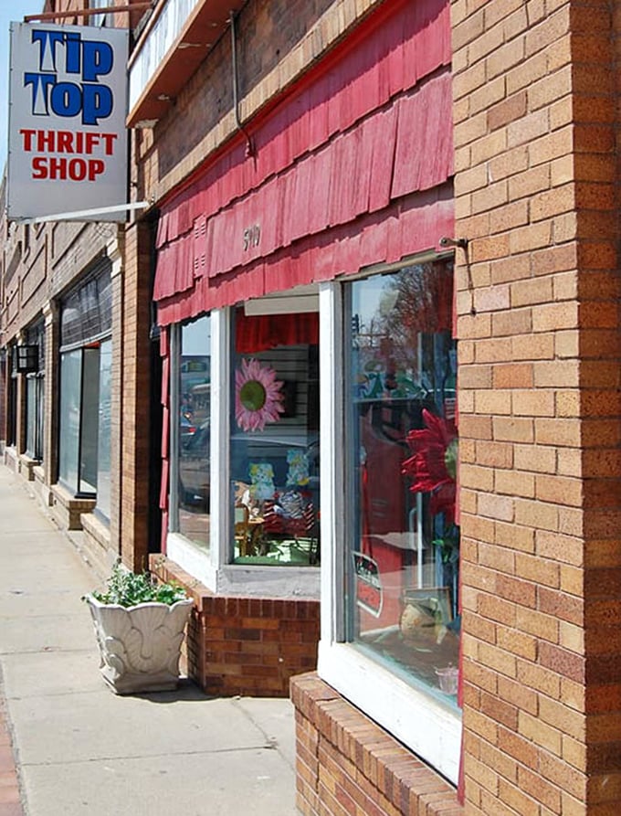 A cheerful flower decoration welcomes shoppers to this brick-clad treasure trove where yesterday's castoffs become tomorrow's conversation pieces.