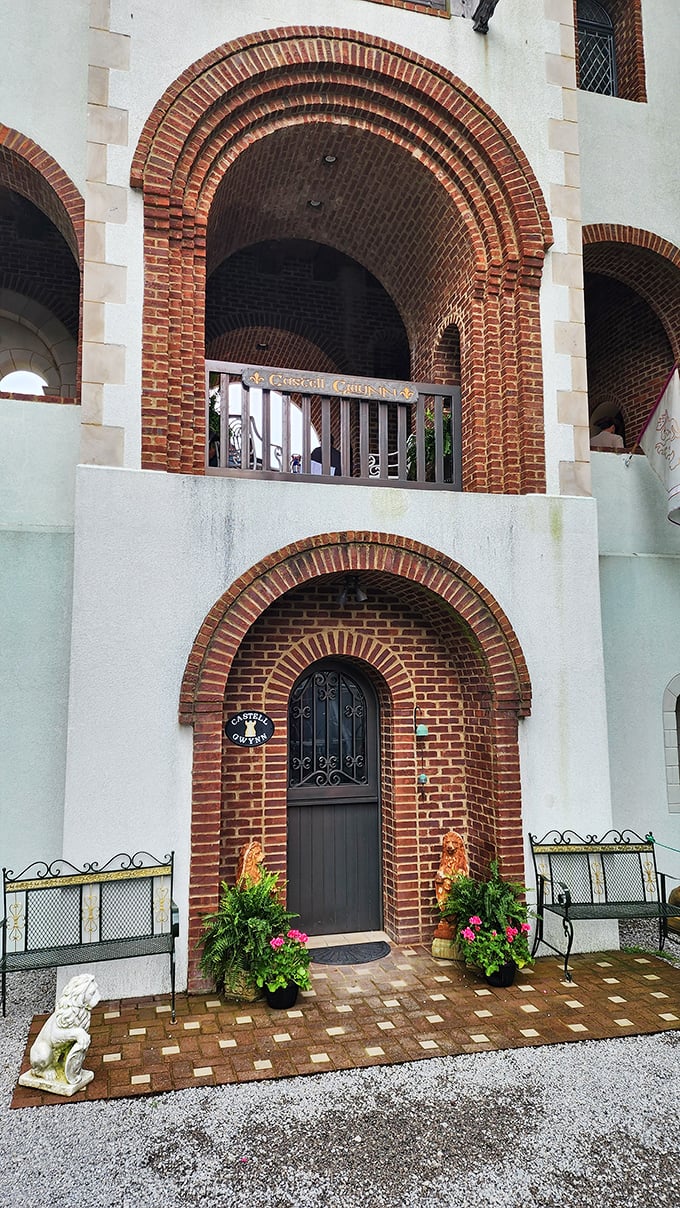 Medieval meets modern at this enchanting entrance, where intricate brick archways and potted flowers welcome visitors to step back in time.