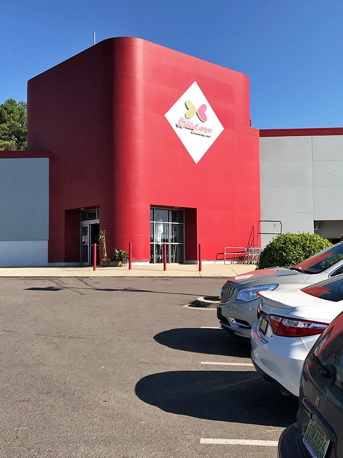 This isn't just an entrance—it's a portal to possibility. The vibrant red facade welcomes treasure hunters with the promise of unexpected finds.