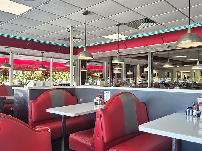 Those red vinyl booths aren't just seating—they're time machines to when conversation mattered more than Wi-Fi passwords.