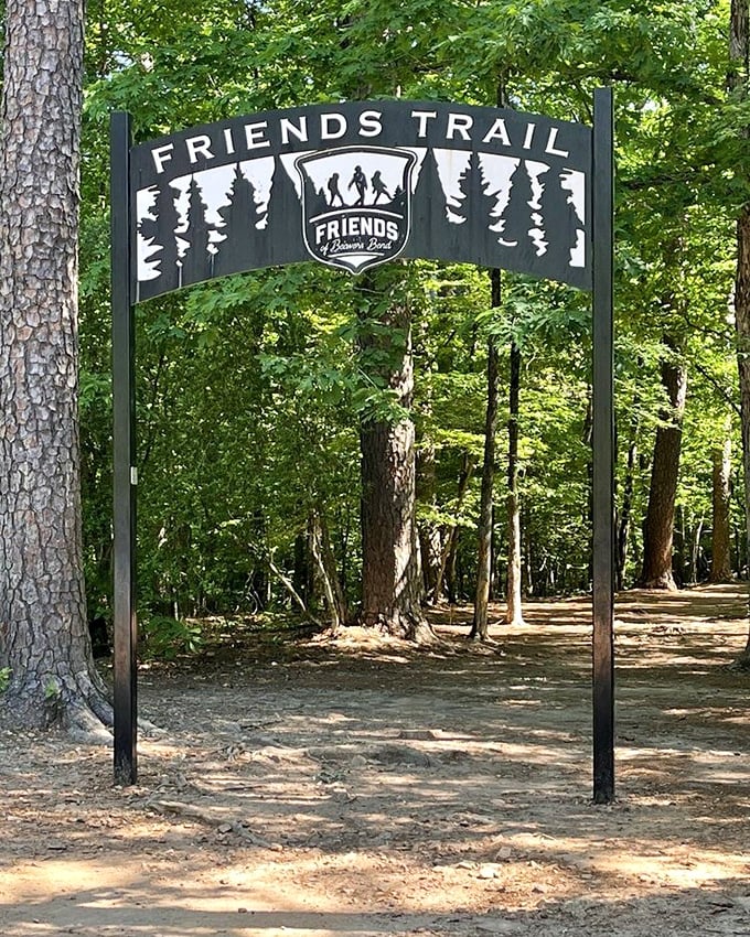 The Friends Trail entrance stands like a portal to another world. Step through, and leave your emails unanswered for a while.
