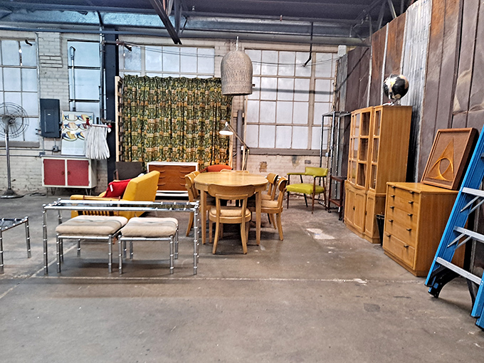 Mid-century meets industrial chic in this furniture vignette. That honey-toned dining set is practically begging to host your next dinner party.