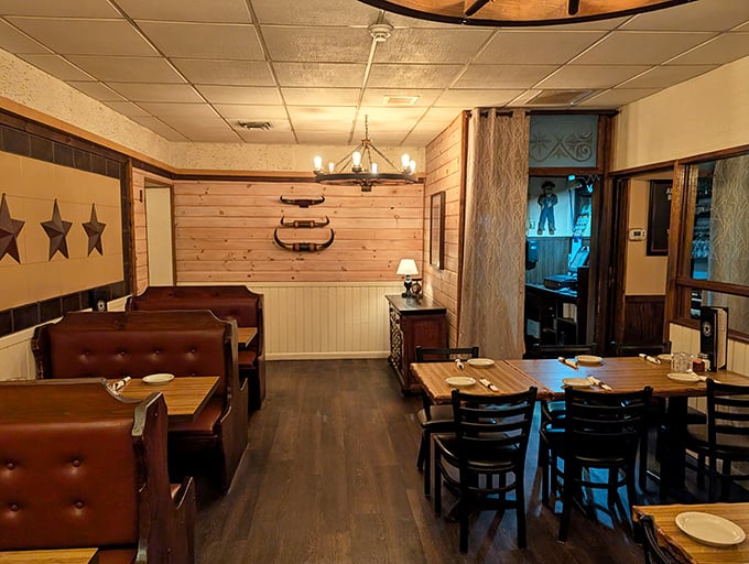 Rustic wooden walls, leather booths, and longhorn décor create that perfect sweet spot between "special occasion" and "comfortable enough for Tuesday night."