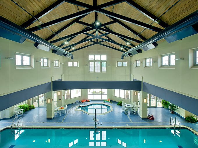 This isn't your grandmother's pool—actually, it is! Soaring ceilings and crystal-clear water make swimming here feel like a vacation, not therapy.