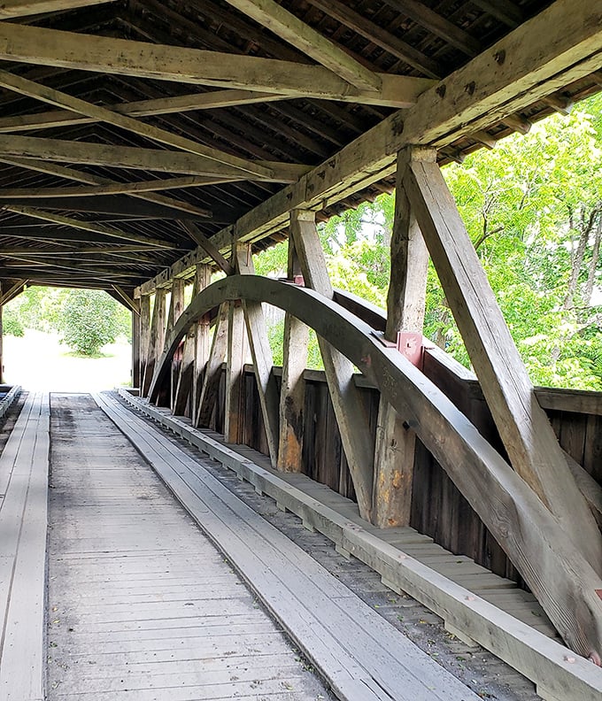 Step inside and you're walking through a wooden cathedral of craftsmanship. The intricate truss system overhead tells stories of engineering ingenuity from another era.