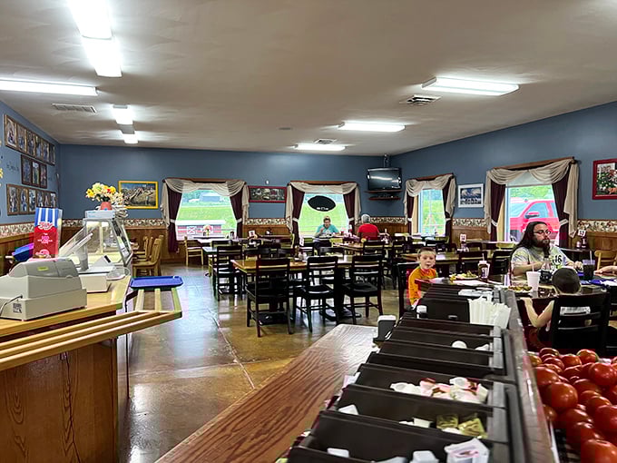 Inside, blue walls and country curtains create the perfect backdrop for family gatherings where memories are made between bites of homestyle cooking.