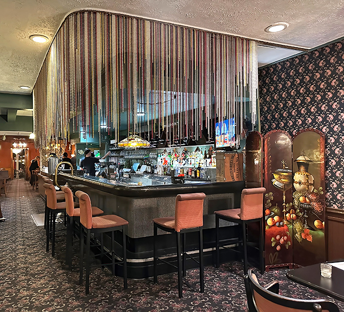 Step into a time machine—Guarino's bar area with its beaded curtains and pink chairs feels like the Italy your grandparents reminisced about.