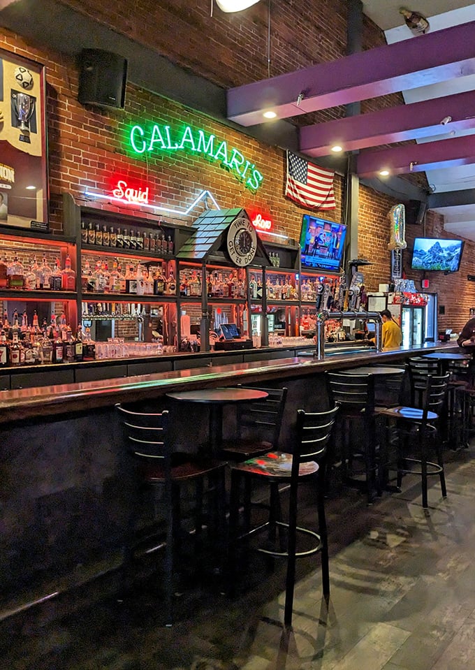 The neon glow of "Calamari's Squid Row" illuminates decades of good times. This bar doesn't just serve drinks—it serves memories.