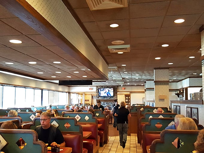 Inside, the classic diner-style booths create that perfect blend of comfort and nostalgia – the kind of place where conversations flow as freely as the coffee.