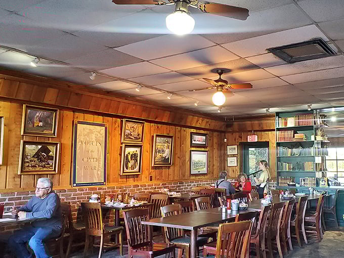 Wood-paneled walls adorned with local memorabilia create the perfect backdrop for catfish conversations. No designer needed – just decades of authentic character.