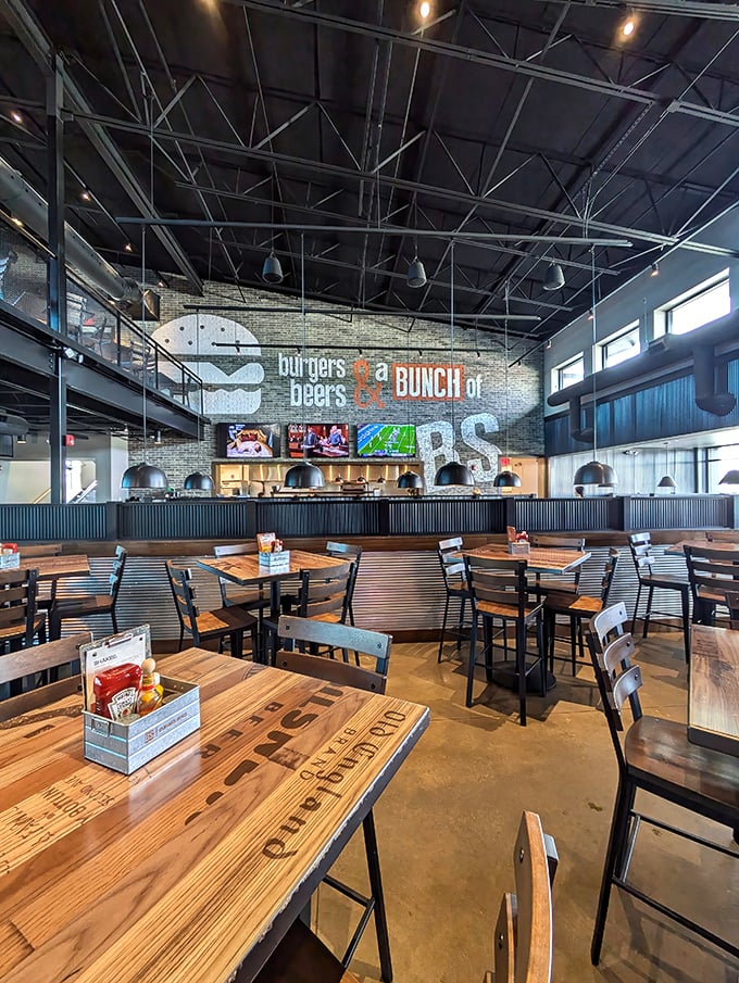 Industrial-chic meets comfort in this thoughtfully designed space where "Burgers, Beers & a BUNCH of BS" isn't just clever wordplay—it's a mission statement.