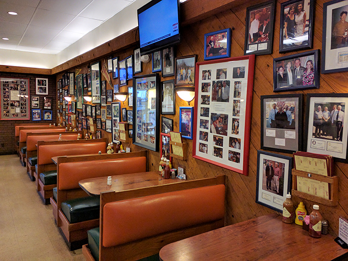 Orange vinyl booths and walls covered with decades of memories—this isn't décor you can buy, it's history you can feel.