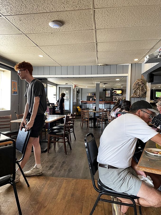 The dining room at Steis's offers that perfect small-town vibe—where conversations flow easily and nobody's checking their watch between bites.