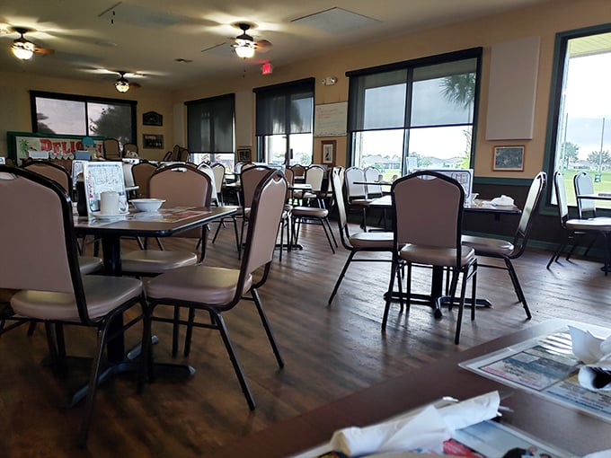 Inside, classic diner comfort awaits with no-nonsense tables, padded chairs, and natural light streaming through windows – simplicity that lets the food be the star.