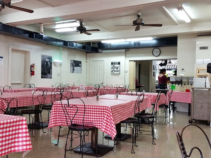 Red and white checkered tablecloths aren't just decoration—they're a promise that no molecular gastronomy will interfere with your comfort food.