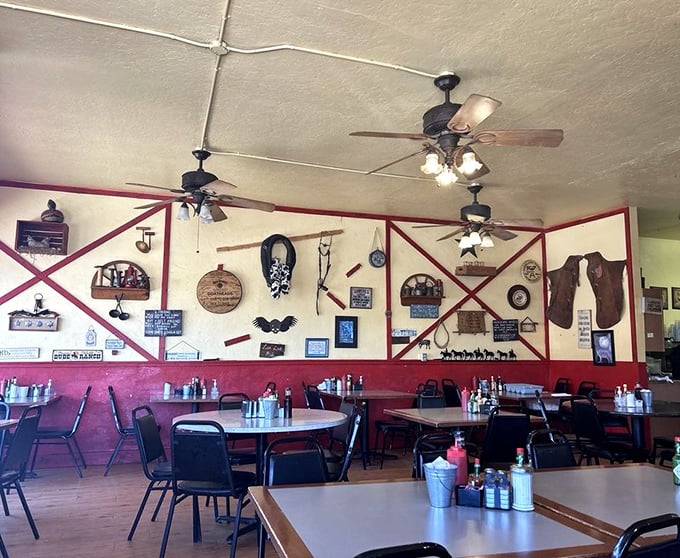 Western memorabilia adorns the walls while ceiling fans lazily spin overhead – this isn't interior design, it's a time machine to simpler days.
