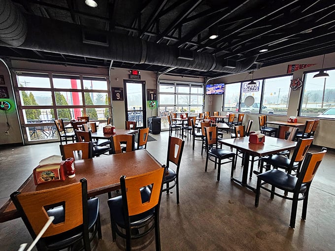 Industrial chic meets barbecue comfort in this no-nonsense dining room where the focus stays squarely where it belongs: on the food.