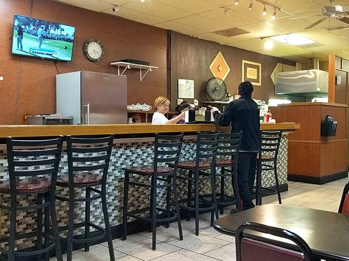 The counter experience at Mi Li feels like home—if home had someone ready to make you perfect Vietnamese food at a moment's notice.