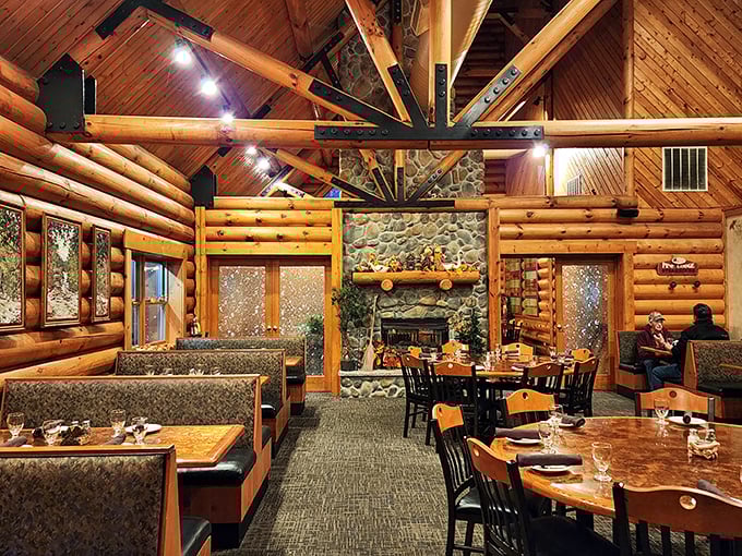 Honey, we've found log cabin heaven! Soaring ceilings, stone fireplace, and golden timber create the perfect backdrop for serious steak consumption.