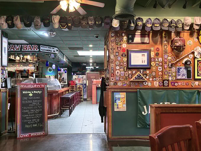 Step inside and you're greeted by a treasure trove of memorabilia—caps lining the ceiling and patches adorning walls—each item telling its own story of good times past.