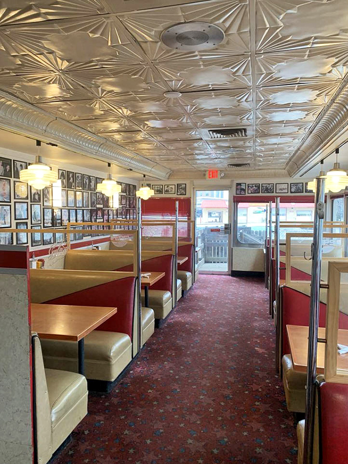 Step inside and the time machine is complete – pressed tin ceiling, cherry-red booths, and that unmistakable diner energy that says "sit down, stay awhile."