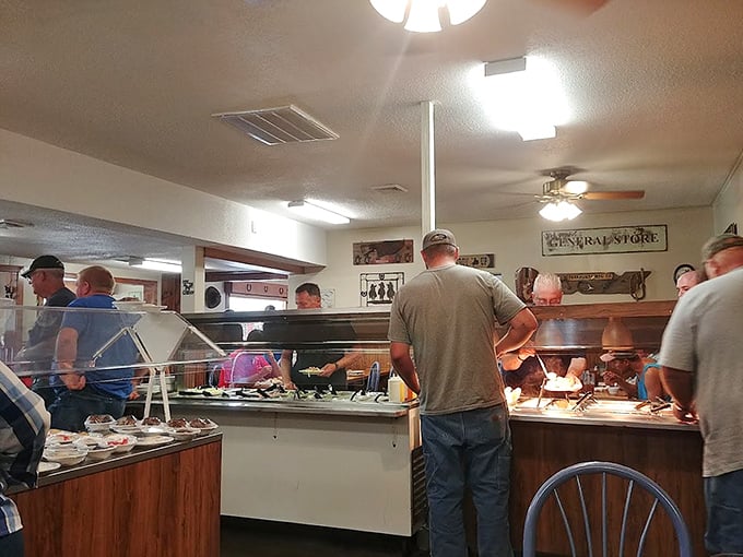 The buffet line at Don's is where dreams and stretchy pants come together. Notice the "General Store" sign – a hint that you'll be stocking up on comfort food memories.