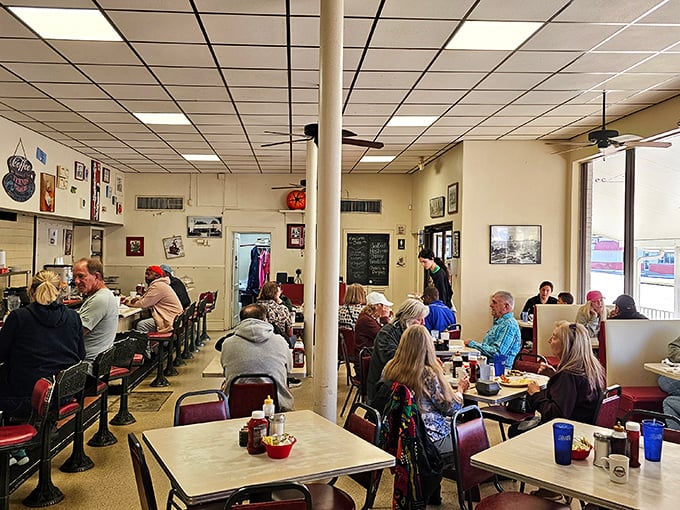 Inside, the bustling dining room hums with conversation and clinking silverware—a symphony of satisfaction conducted under fluorescent lights and ceiling fans.