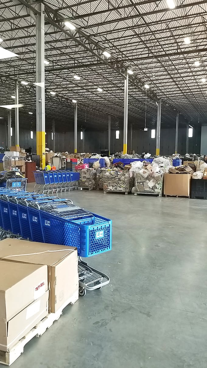 Welcome to the warehouse wonderland! This cavernous space houses countless potential treasures waiting to be discovered by savvy shoppers.