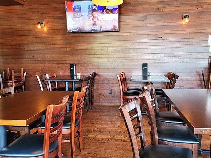 Warm wood paneling and comfortable seating create that perfect "Goldilocks zone" of restaurant ambiance – not too fancy, not too casual, just right.