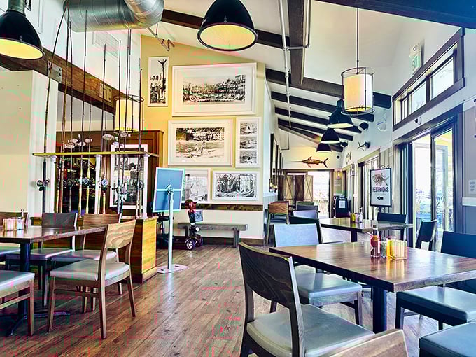 High ceilings, historic photos, and nautical touches—this interior feels like the living room of a sea captain with excellent taste.
