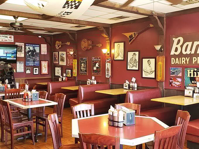 Step inside and you're transported to barbecue paradise – burgundy walls adorned with memorabilia create the perfect backdrop for serious meat appreciation.