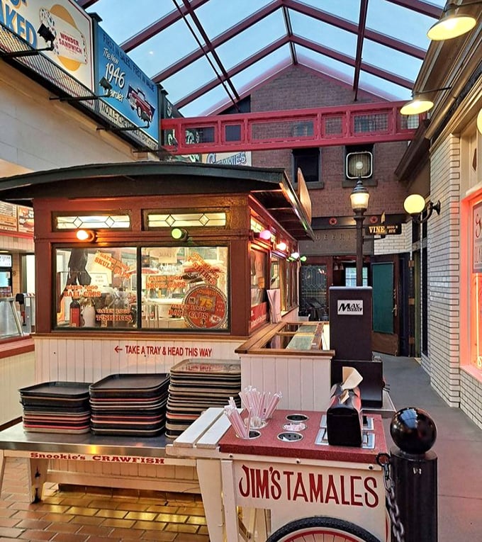 Step inside and the cafeteria-style setup reveals itself—grab a tray, follow the arrows, and prepare for that famous "Hi, may I help you?" greeting that's launched a thousand meals.
