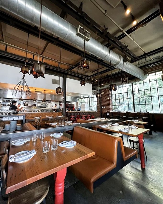 The dining room's exposed ducts and leather banquettes create that perfect "I've discovered something special" atmosphere. Industrial never felt so inviting.