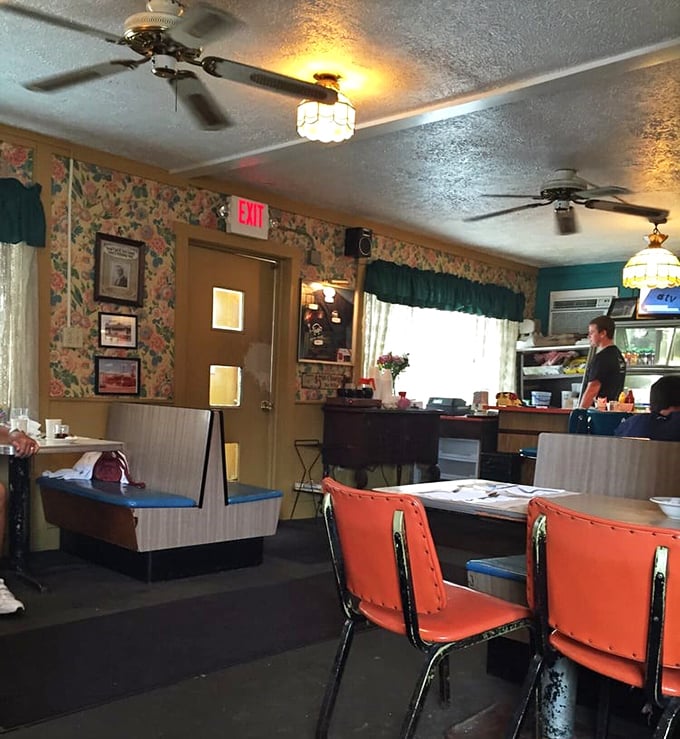 Step inside and time travel to when floral wallpaper and orange vinyl chairs weren't retro—they were just Tuesday. This isn't manufactured nostalgia; it's the real deal.