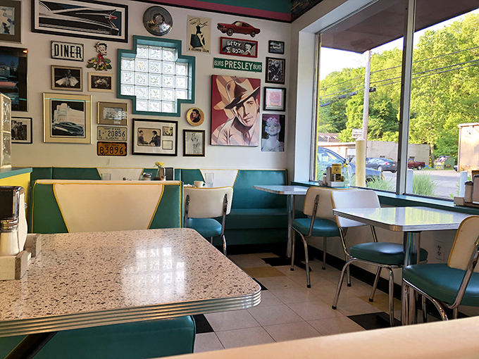 Elvis watches over diners from the wall as vintage-style booths invite you to slide in and stay awhile.