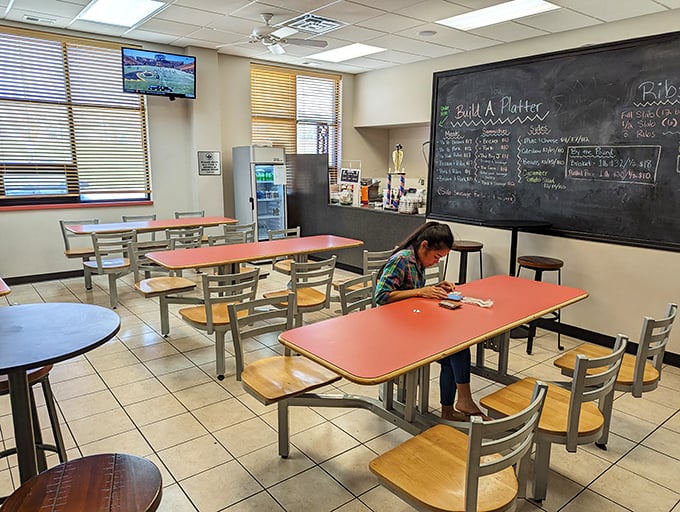 No-frills dining at its finest. The chalkboard menu and simple tables let you focus on what matters—the transcendent barbecue that's about to arrive.