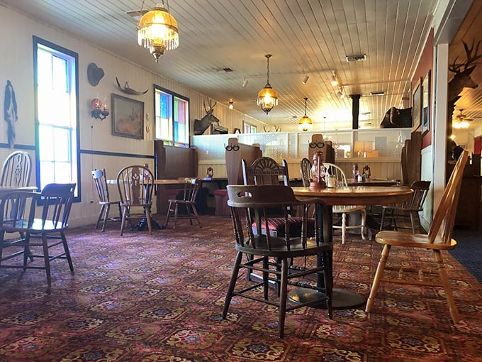 Step inside and time travel to the Old West. The patterned carpet, wooden chairs, and antler decor create the perfect backdrop for serious meat consumption.