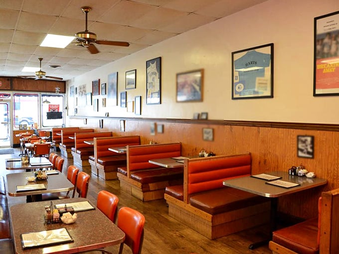 Classic orange vinyl booths that have cradled generations of hungry Hoosiers. This isn't décor—it's a time machine with table service.