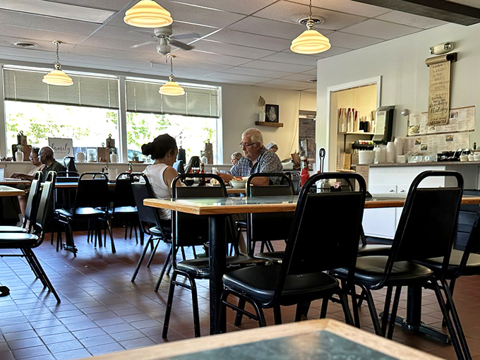 Simple, clean, and welcoming – the dining room at Katie's Kitchen puts the spotlight where it belongs: on the food and the company you share it with.