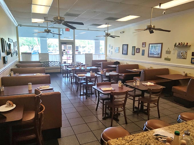 Inside, ceiling fans lazily spin above a dining room that whispers "come, sit, stay awhile" – the antithesis of trendy eateries rushing you through brunch.