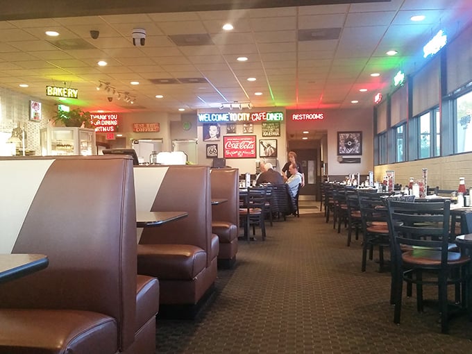 Classic brown booths and neon signs create that timeless diner atmosphere where comfort food and comfort seating go hand in hand.