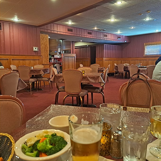 Step inside and you're transported to the golden age of supper clubs. Wood paneling, comfortable chairs, and that unmistakable "you're about to eat well" ambiance.