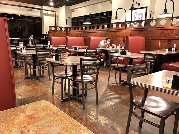 Red booths, warm wood paneling, and just the right lighting—this isn't just a place to eat, it's a place to linger and make memories.