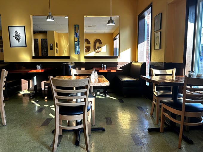 Warm yellow walls and wooden tables create that perfect "stay awhile" vibe—like breakfast at a friend's house, if your friend were a culinary genius.