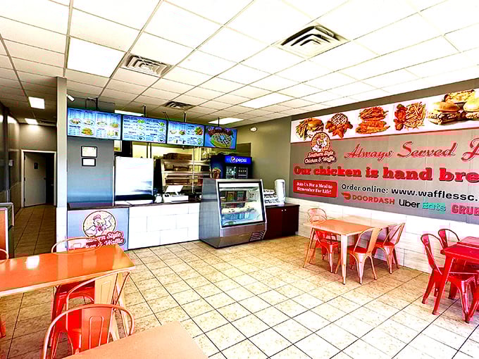 No-frills interior with a focus on what matters: that glorious menu board and the kitchen where the magic happens.