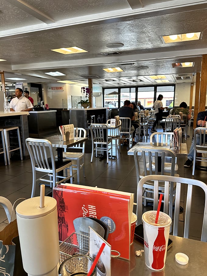 Simple metal chairs and no-nonsense tables tell you everything: Hires Big H puts its energy into the food, not fancy furniture.