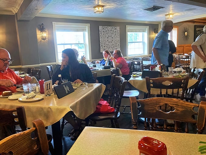 Where memories are made. The cozy dining room with white tablecloths strikes that perfect balance between casual comfort and special occasion elegance.
