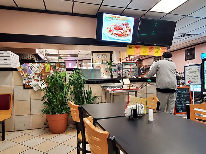 Potted plants add homey touches to Gabriel's no-frills interior. This isn't about fancy decor—it's about the serious business of feeding people well.